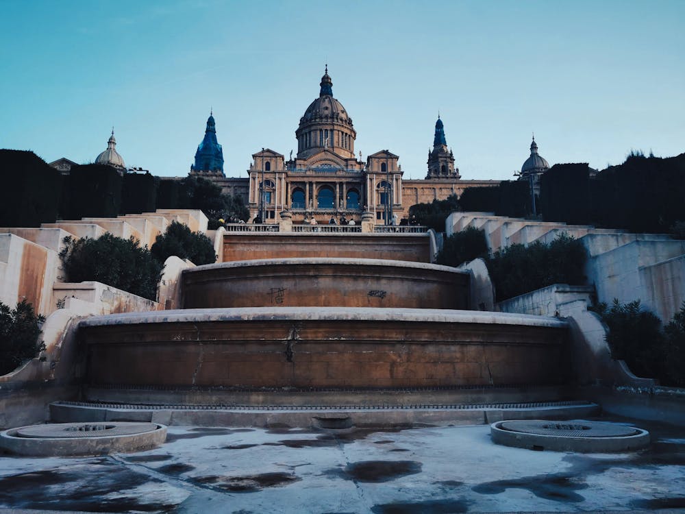 View of Palau Nacional with the empty Magic Fountain of Montjuic during evening