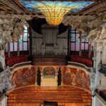 Ornate exterior facade of the Palau de la Musica Catalana showing Modernist sculptural details