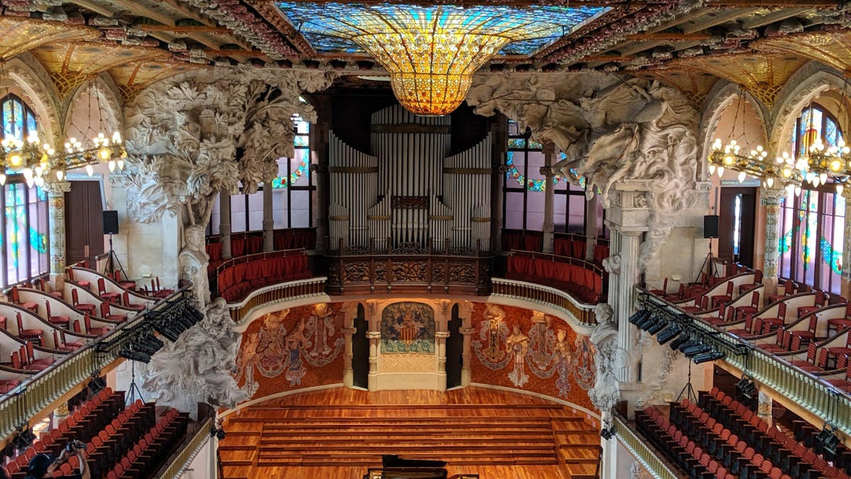 Ornate exterior facade of the Palau de la Musica Catalana showing Modernist sculptural details