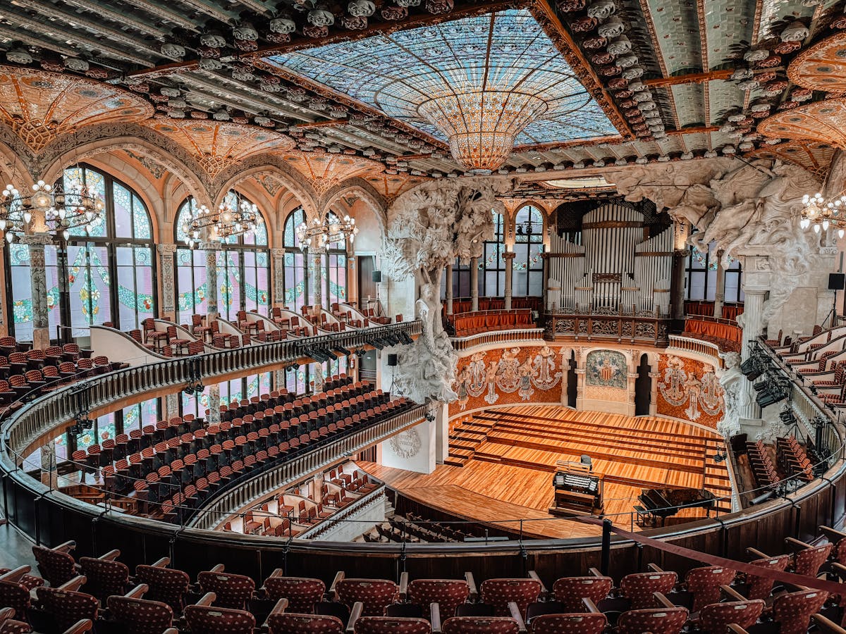 Stunning interior view of the Palau de la Musica Catalana in Barcelona showing ornate design