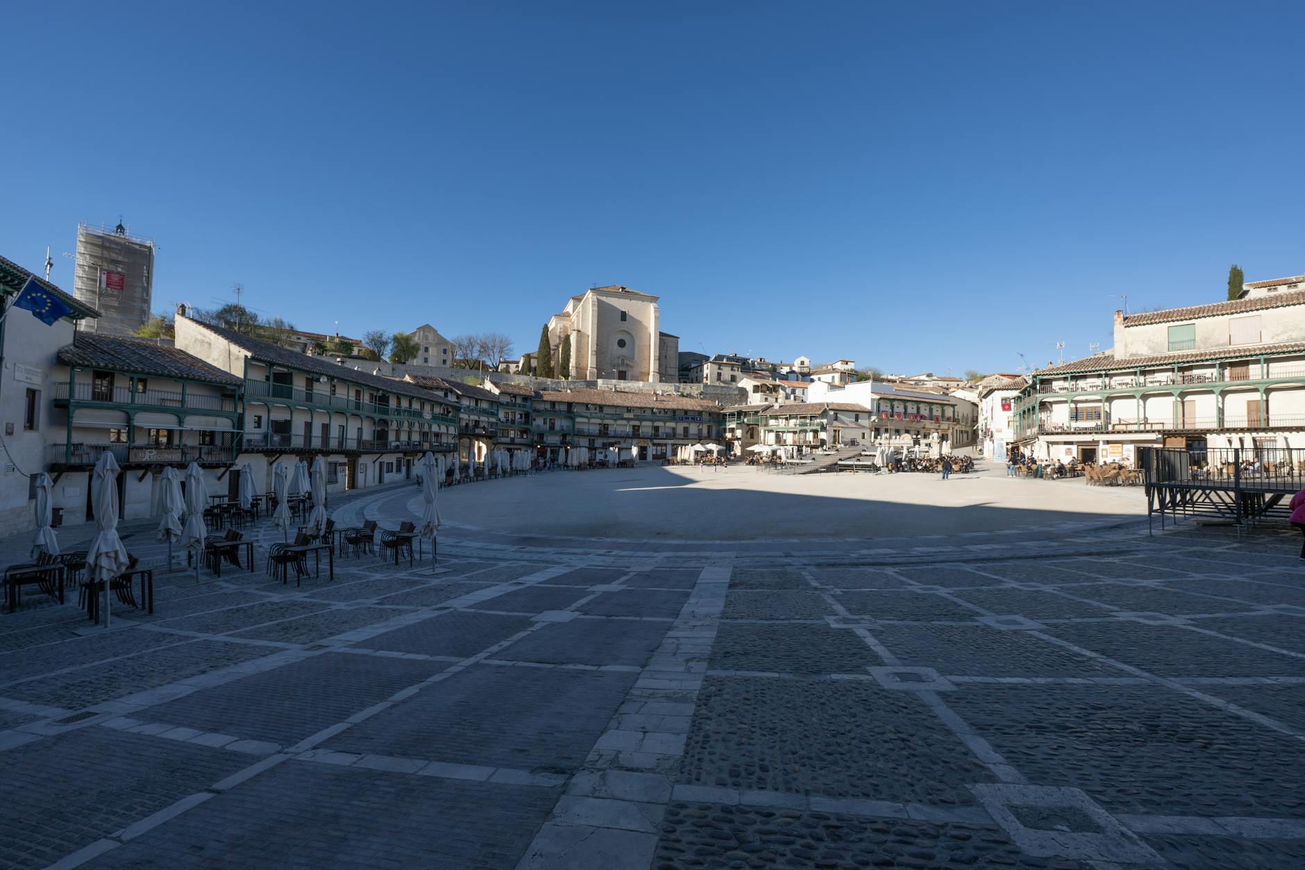 Town square with palm trees and historic buildings in Palma de Mallorca