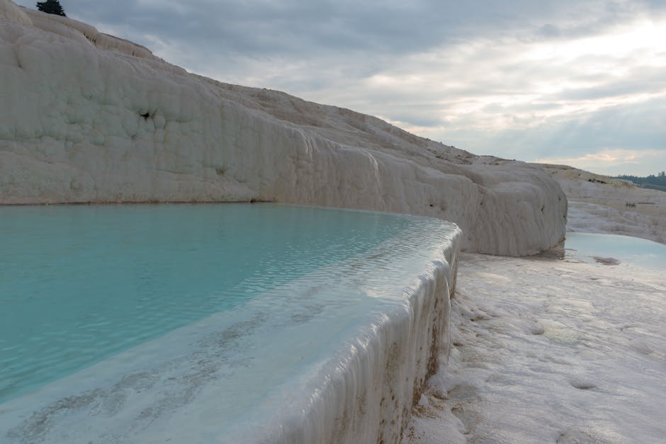The travertines are whiter in person than any photograph makes them look, and the morning light is when they really glow