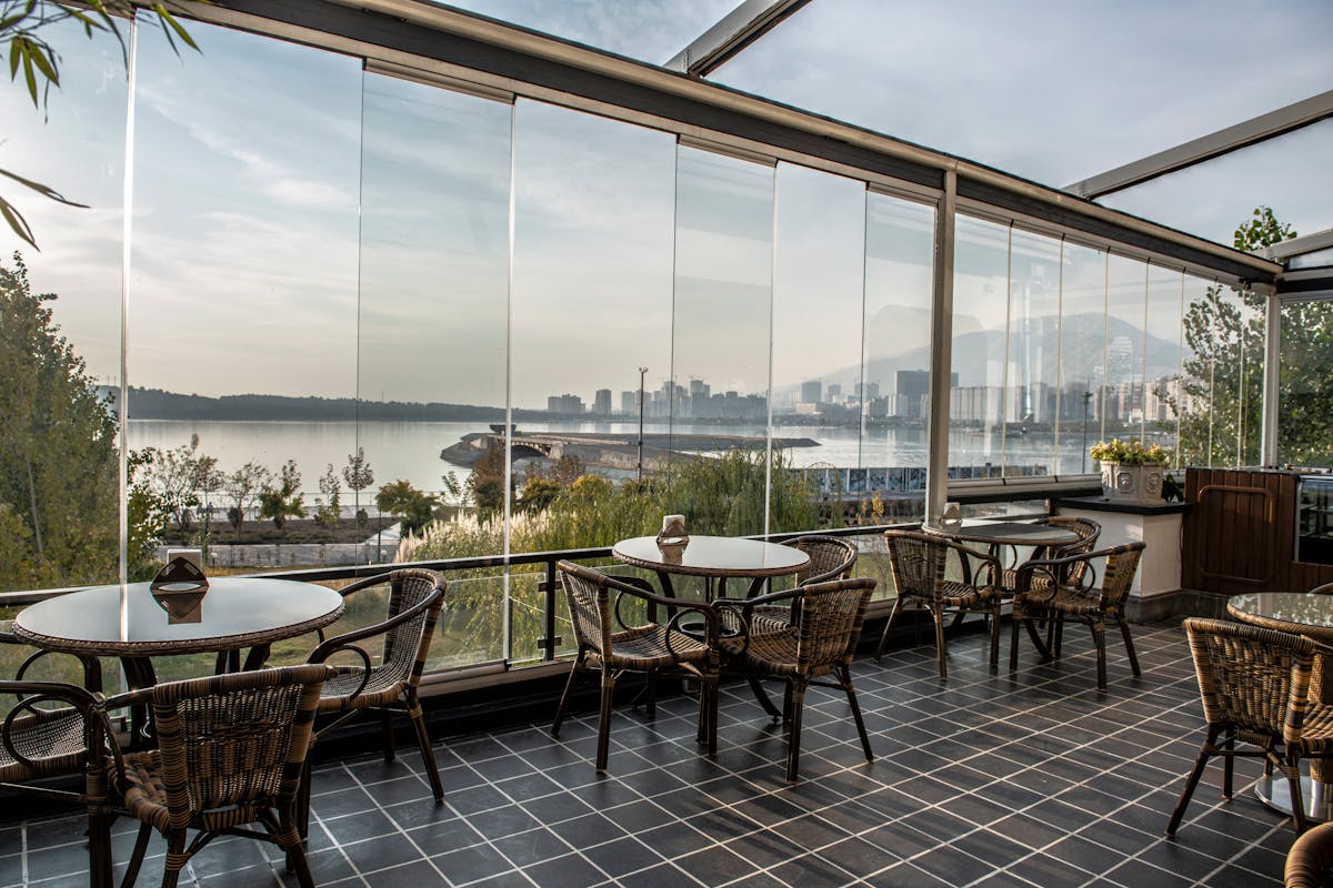 Modern cafe terrace with river and city views in Paris