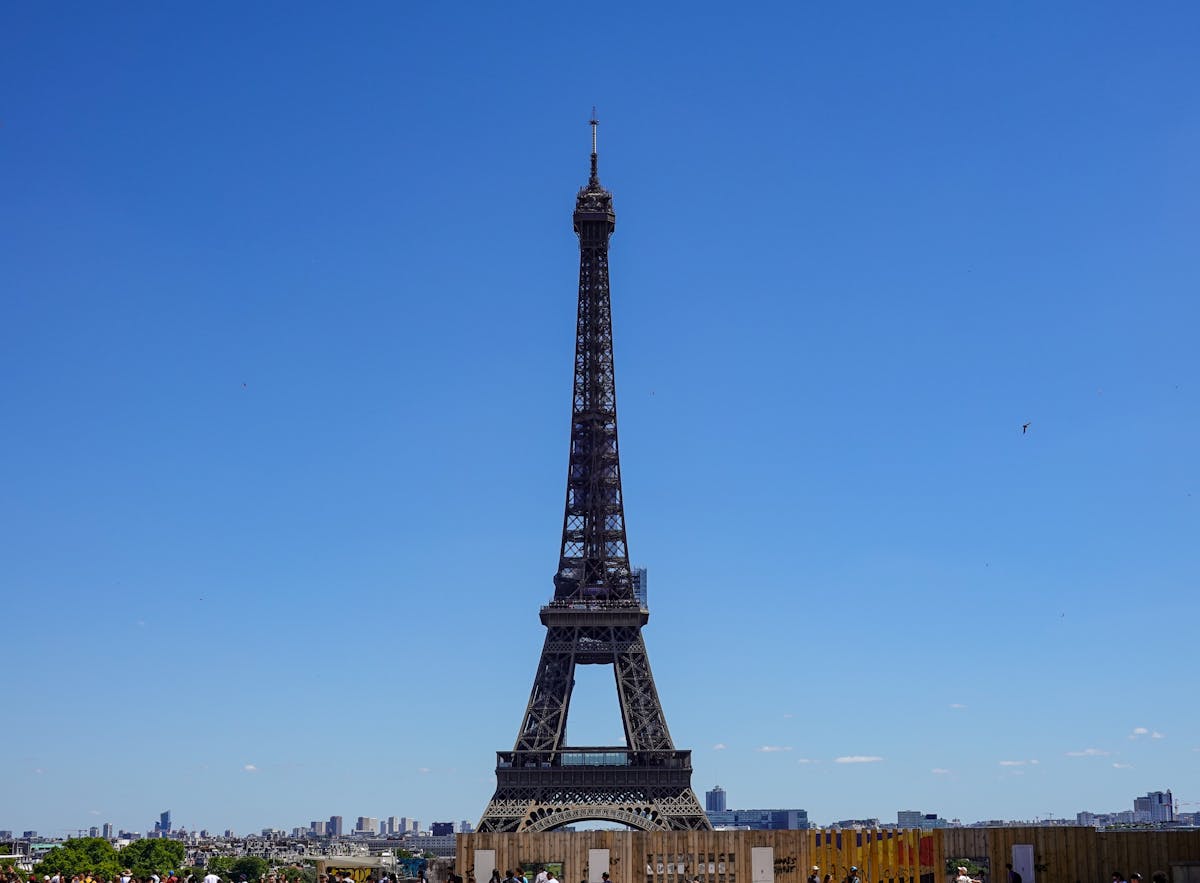 The Eiffel Tower against a clear blue sky in Paris