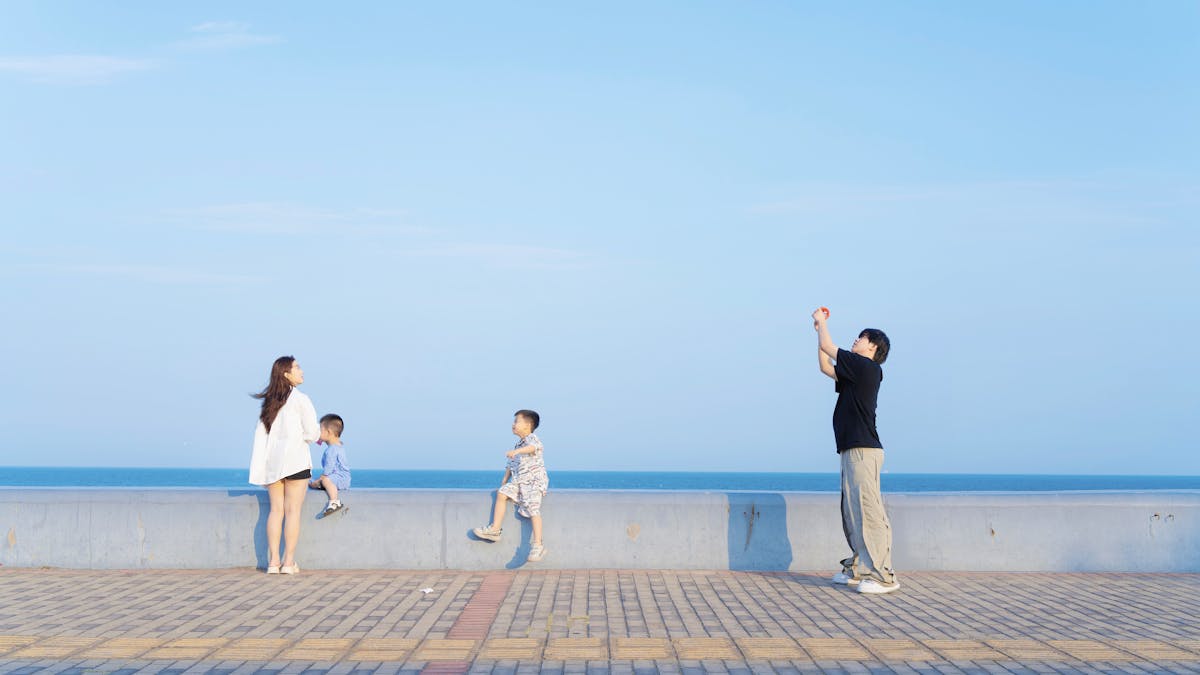 Family exploring Paris streets with children