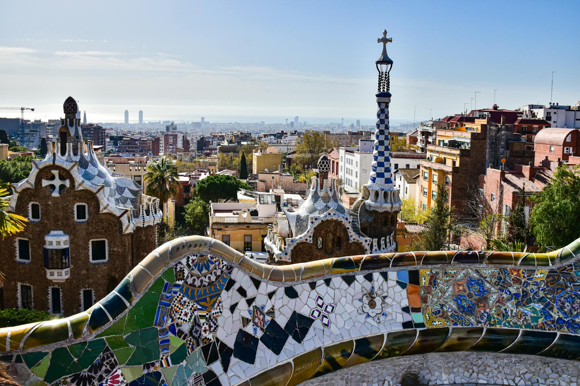 Gaudi mosaic architecture at Park Guell with Barcelona cityscape view