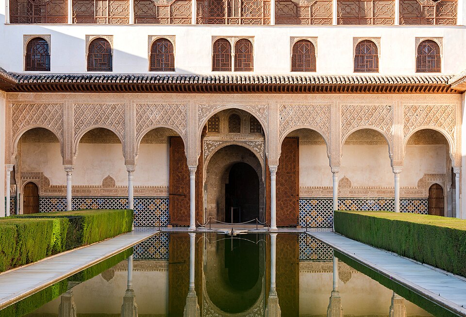 The Patio de los Arrayanes reflecting pool with myrtle hedges at the Alhambra