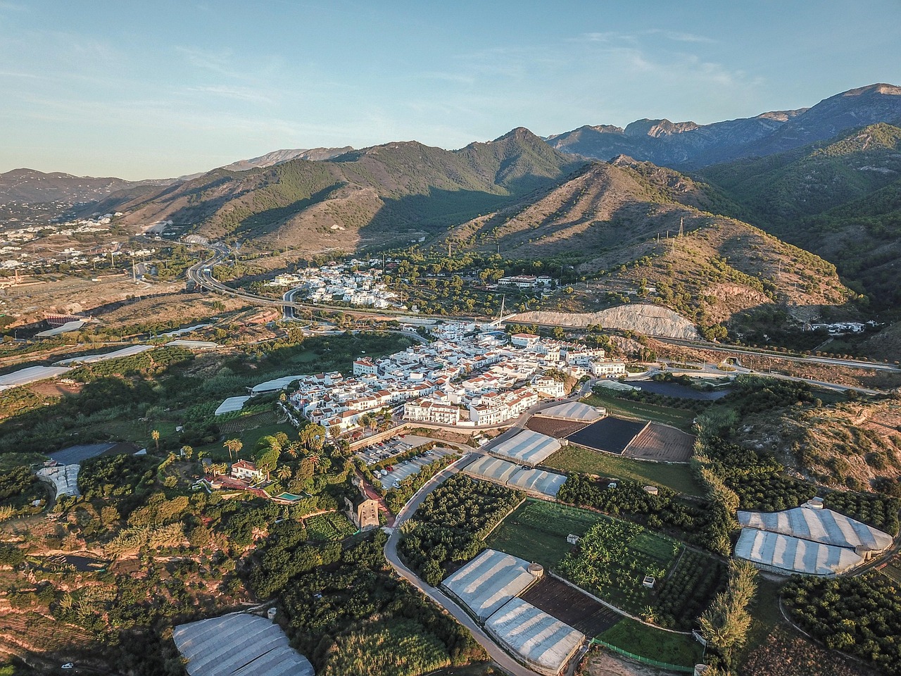 Village of Maro near the Caves of Nerja with white buildings and mountains