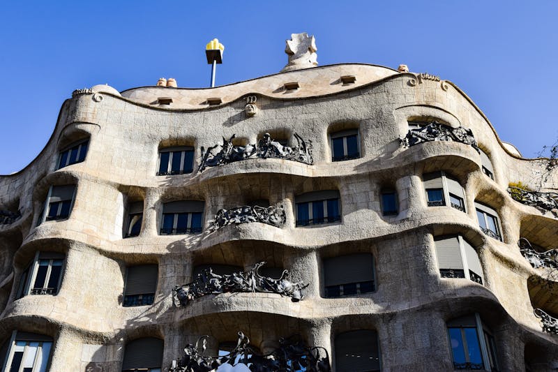 Detailed architectural view of Casa Mila La Pedrera showing Gaudi design elements