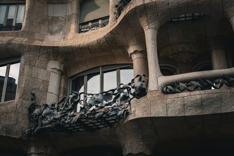 Close-up of the ornate facade of Casa Mila showing Gaudi unique architectural design