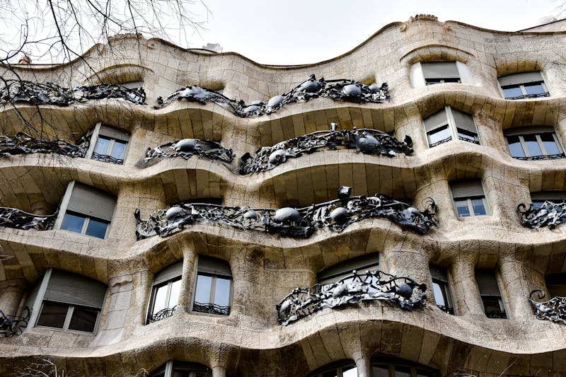 Full view of the wavy facade of Casa Mila La Pedrera a Gaudi masterpiece in Barcelona