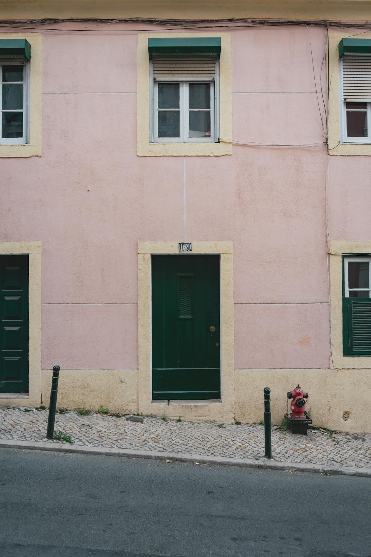 Traditional pink building facade in Lisbon