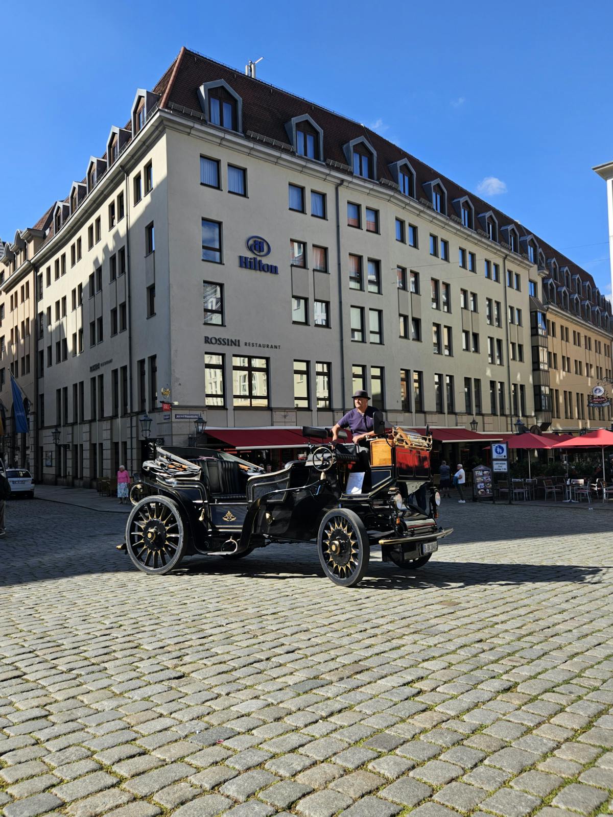 Cobblestone street in Dresden old town with baroque buildings