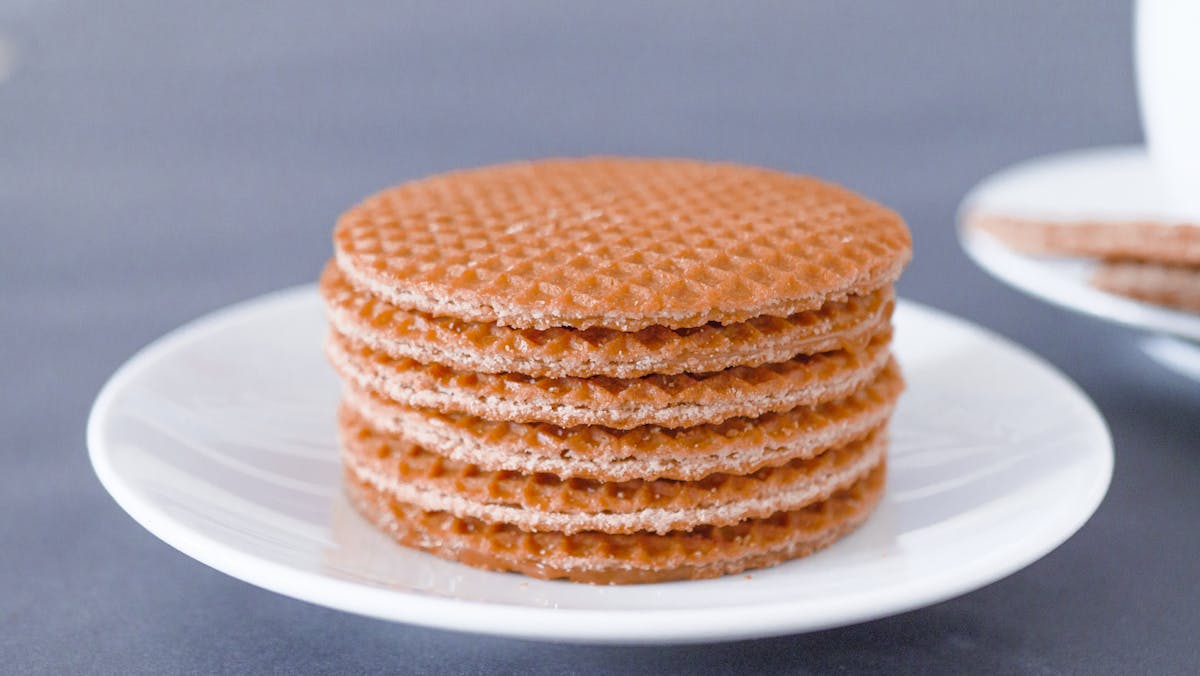 Close-up of stacked stroopwafel cookies on a white plate