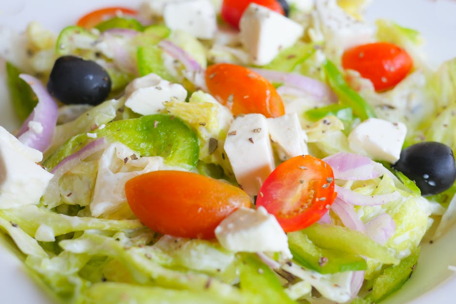 Close-up of vibrant Greek salad with feta cheese, tomatoes, and olives