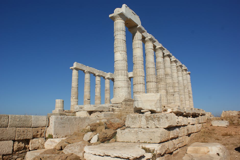 Majestic view of the ancient Temple of Poseidon under a clear blue sky