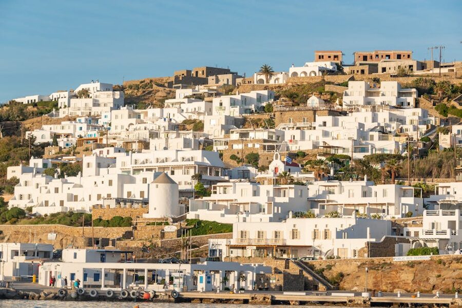 Traditional whitewashed Cycladic houses on a Greek island in daytime