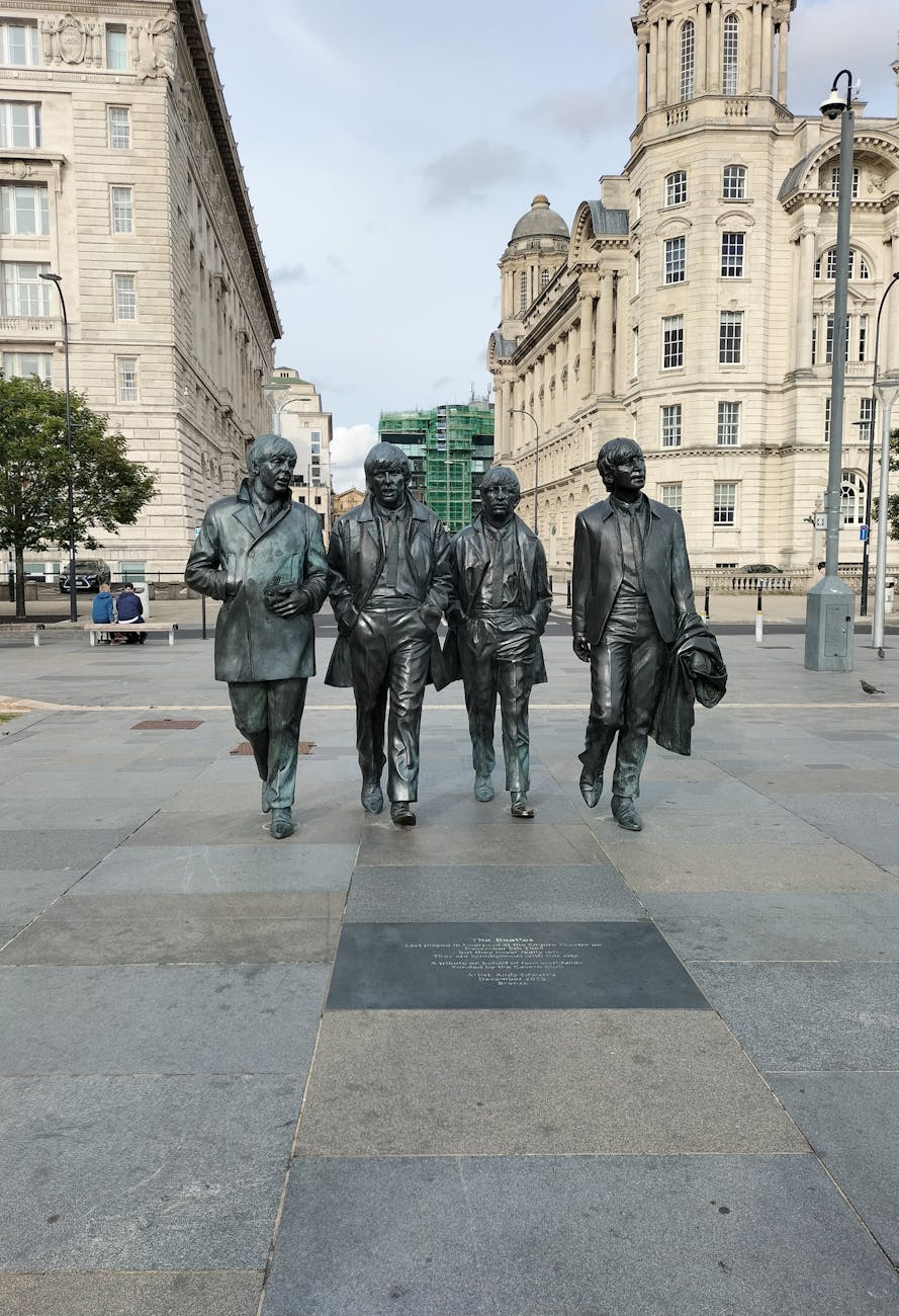 The Beatles statue in Liverpool showcasing iconic music landmark