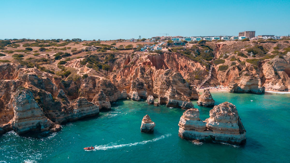 Aerial shot of the rocky coastline in Lagos, Algarve region