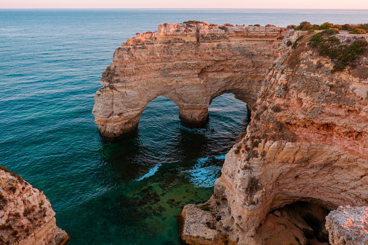 Stunning Algarve cliffs at sunset showcasing Portugal natural beauty