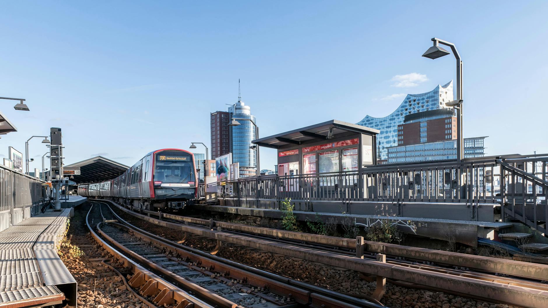 Train at Hamburg station with the Elbphilharmonie concert hall in the background