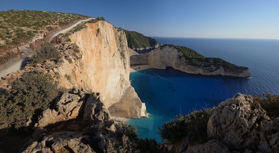 Aerial view of Navagio Beach's cliffs and turquoise waters
