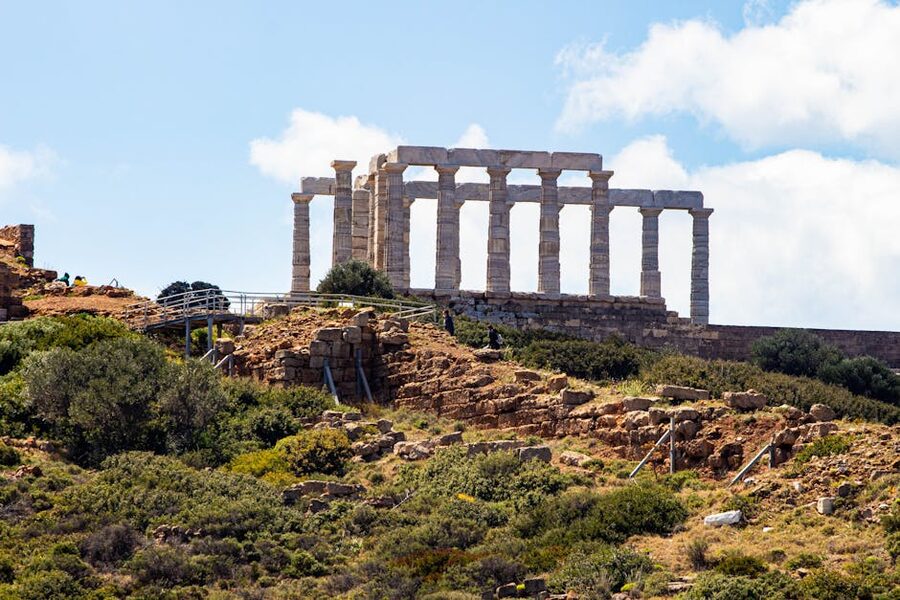 Ancient Temple of Poseidon at Cape Sounion with stunning coastal views