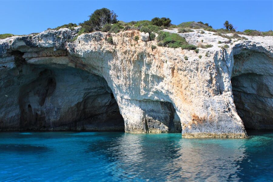 Blue Caves with clear turquoise waters and unique rock formations in Zakynthos