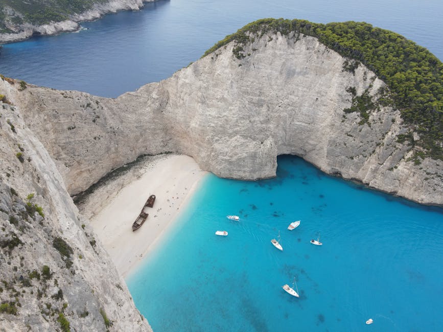 Aerial view of Navagio Beach with shipwreck and vibrant blue waters