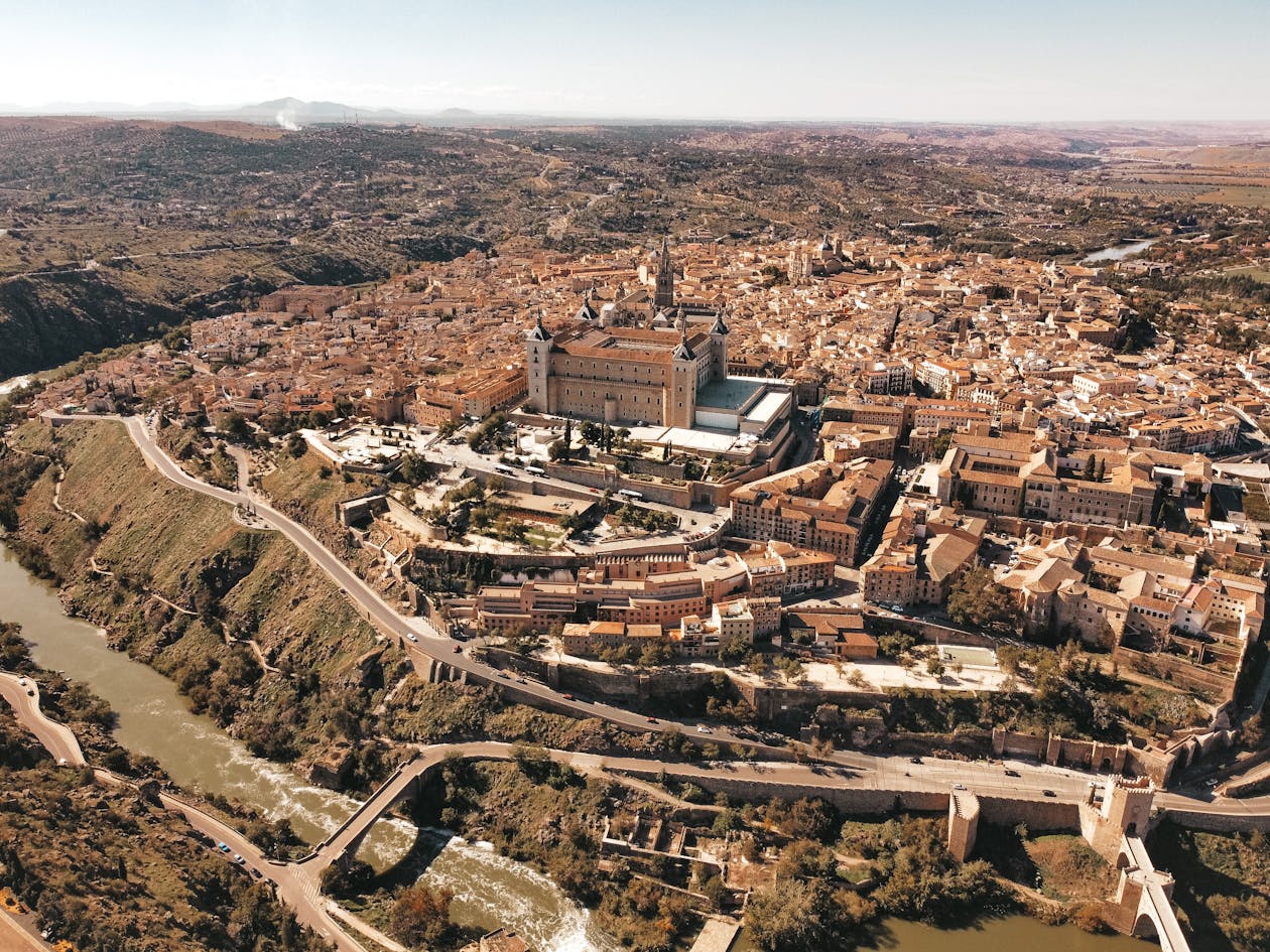 Drone shot of Toledo Spain historic cityscape showing iconic architecture