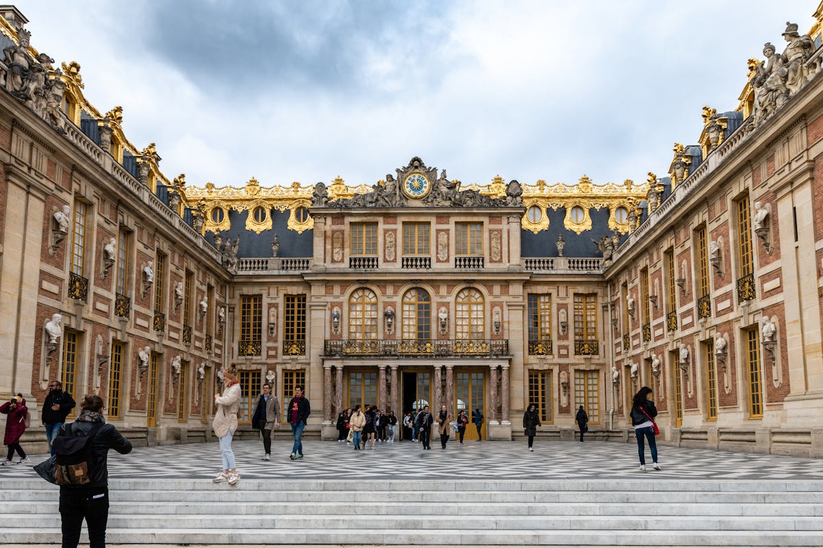 Baroque facade of the Palace of Versailles seen from the courtyard
