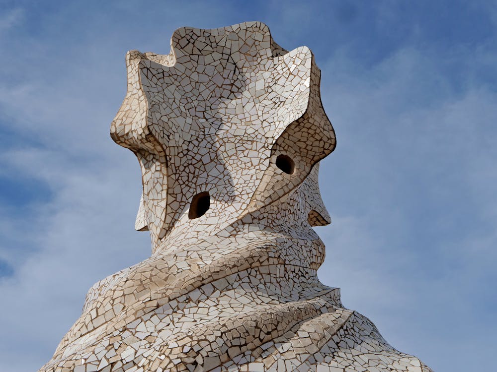 Close-up of iconic mosaic chimney on Casa Mila roof designed by Gaudi in Barcelona