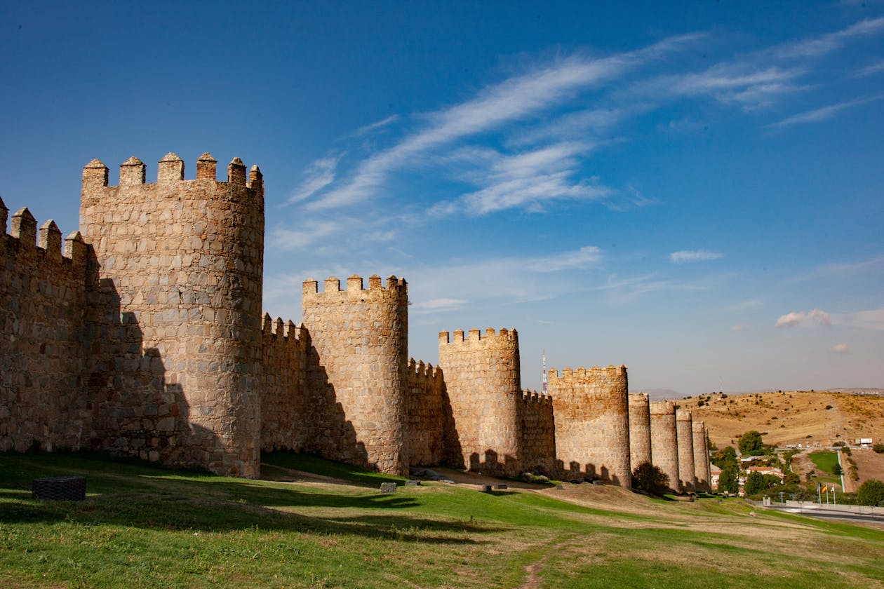 Historic stone walls of Avila on a sunny day in Spain