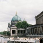 Berlin Cathedral and river cruise creating a picturesque urban scene