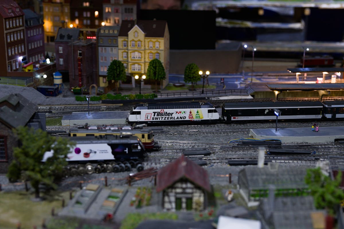 Intricate model train set featuring Swiss locomotive and detailed town