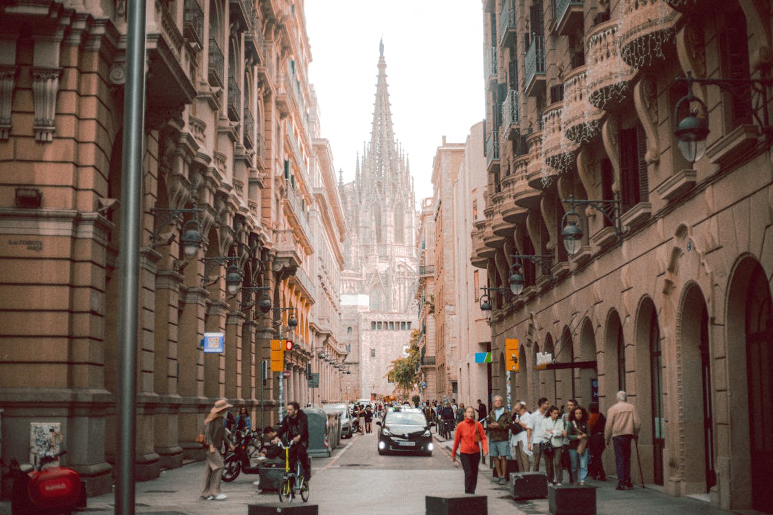 Street view in Barcelona Gothic Quarter with cathedral visible