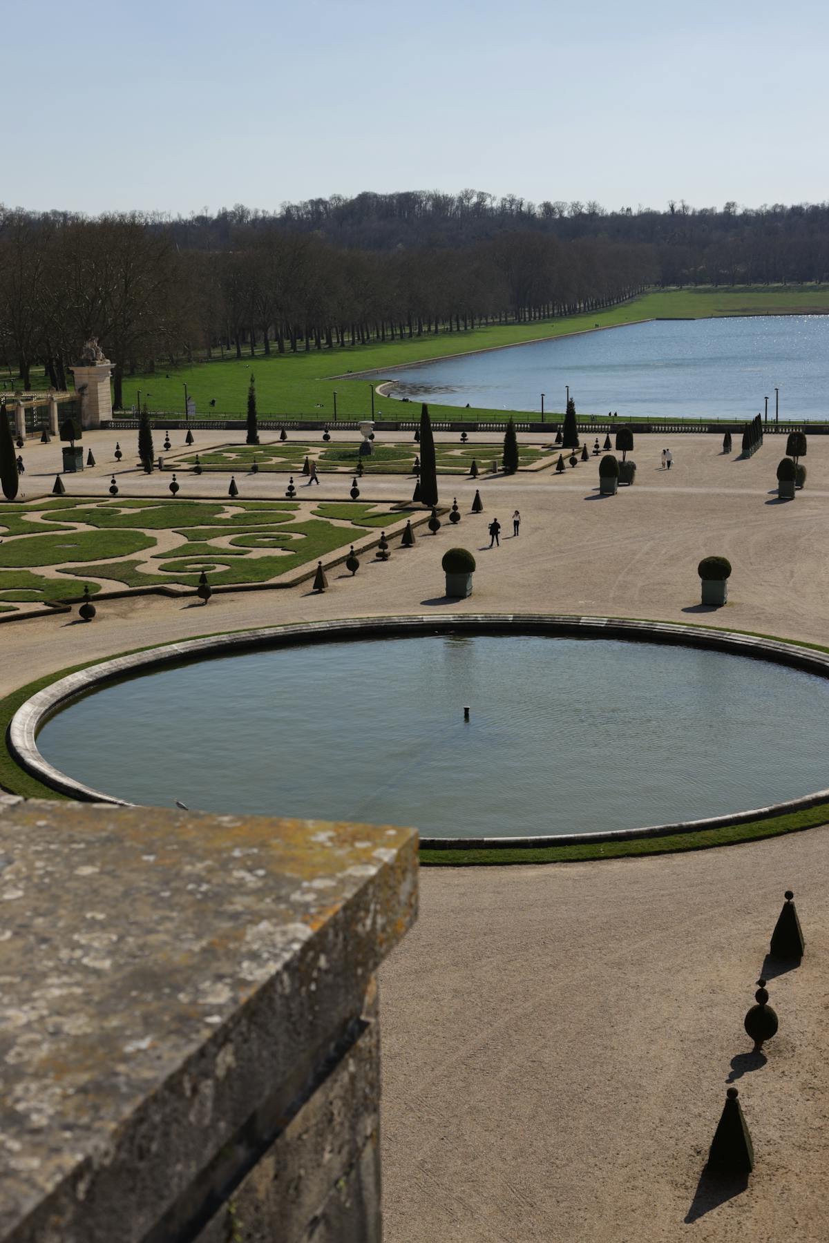 Meticulously landscaped gardens at Versailles Palace in spring