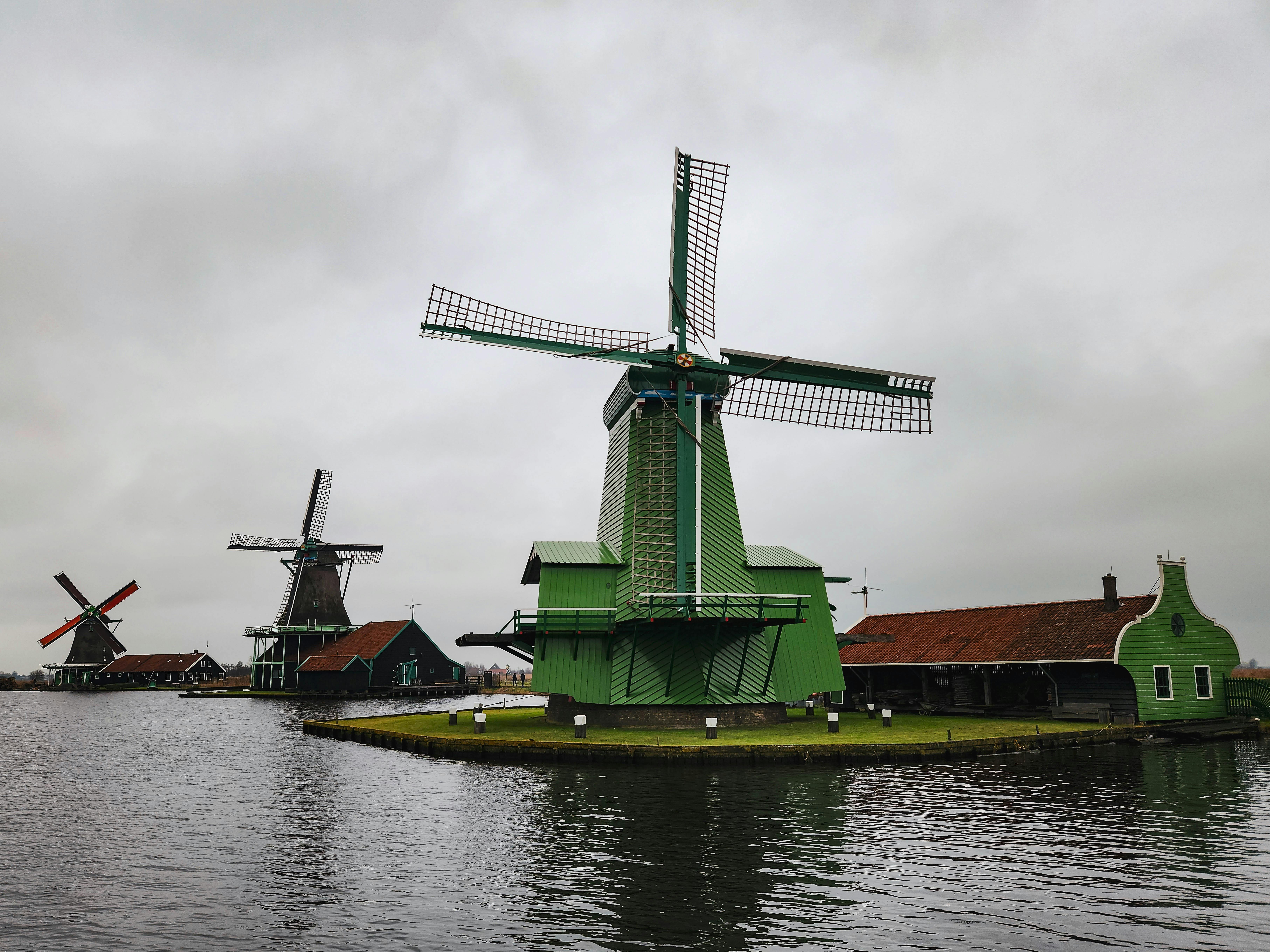 Windmills and traditional Dutch buildings at Zaanse Schans in the Netherlands