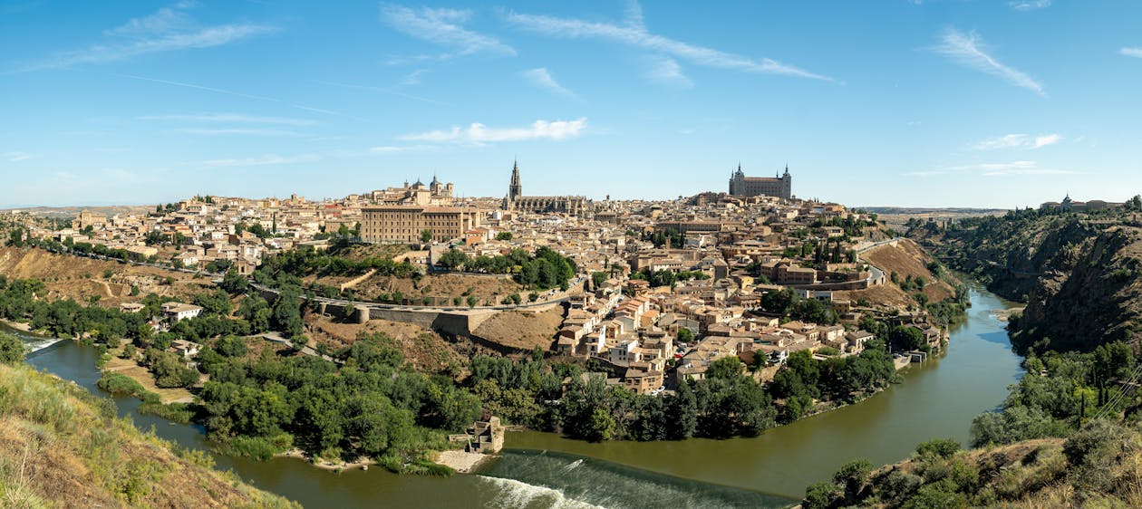 Panoramic view of Toledo Spain from across the Tagus River showing the hilltop city