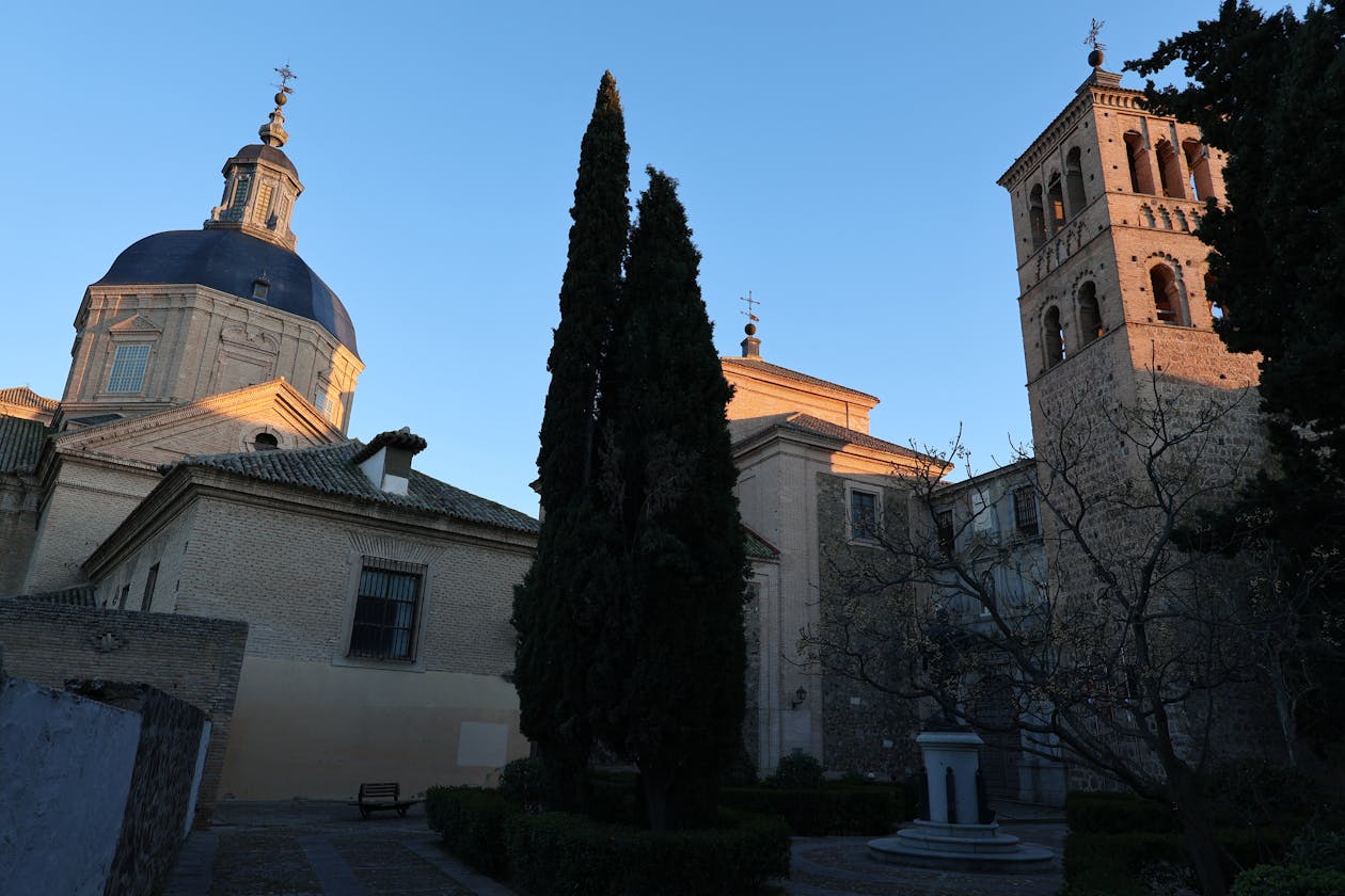 Stunning architecture of a historic church in Toledo Spain illuminated at sunset