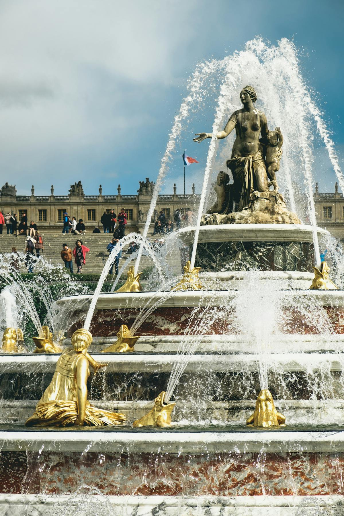Latona Fountain with ornate sculptures in the Gardens of Versailles