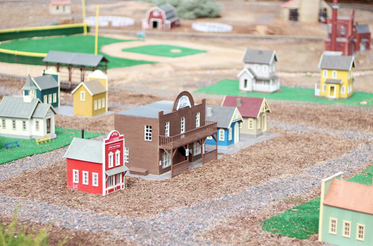 Colorful model town display depicting small houses and structures