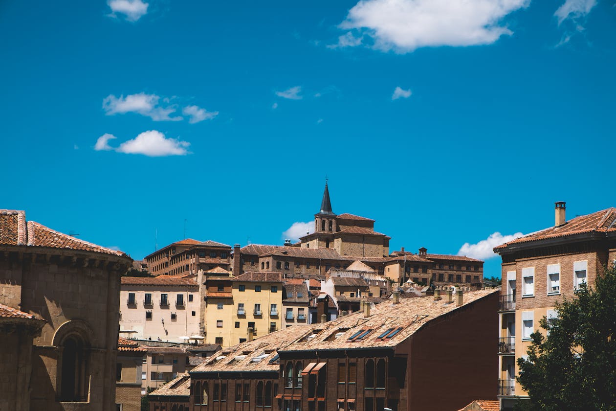 Charming view of Segovia old town under a bright blue sky