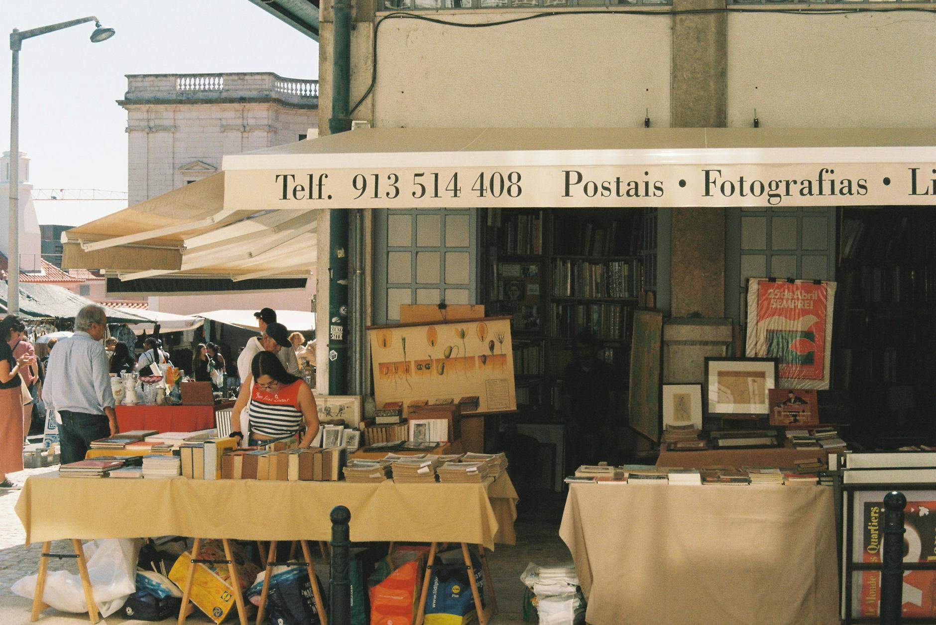 Colorful street market scene in Lisbon on a sunny day