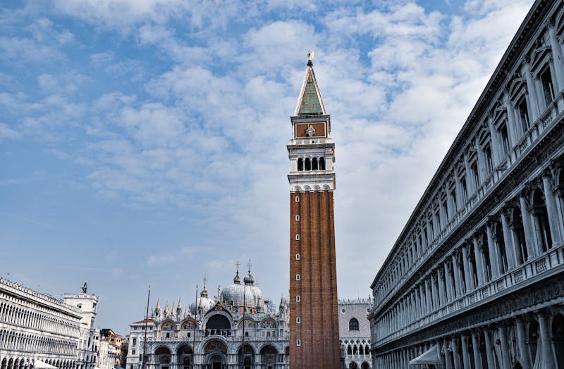 The bell tower and basilica of St Marks rising above the rooftops of Venice