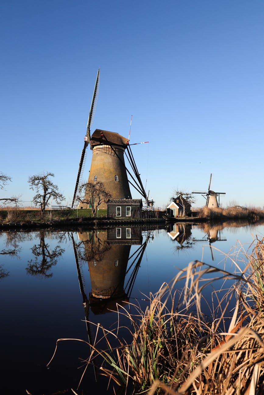 Kinderdijk windmills reflected on a clear day in the Netherlands