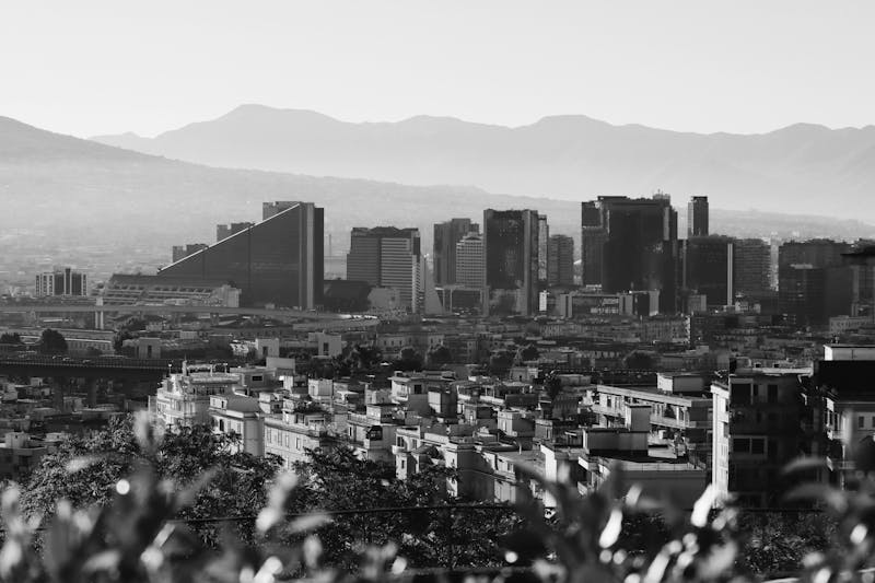 Aerial view of Naples cityscape with Mount Vesuvius in the background