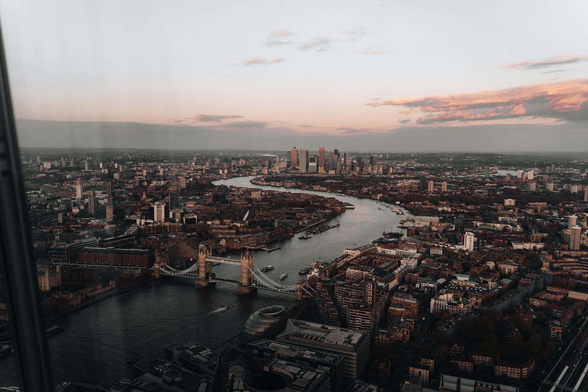 Aerial photograph of central London showing the Shard, Tower Bridge, and the Thames