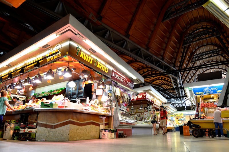 Interior of Mercat de Santa Caterina market in Barcelona with shoppers