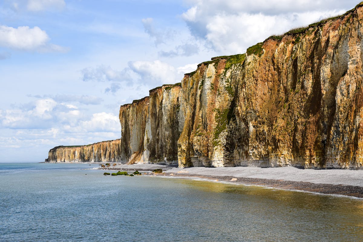 Dramatic white cliffs of Etretat along the Normandy coastline in France
